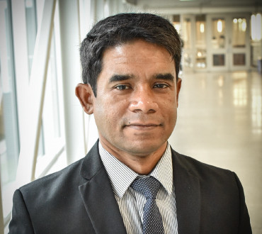 Centennial College - Dr. Nurul Huda